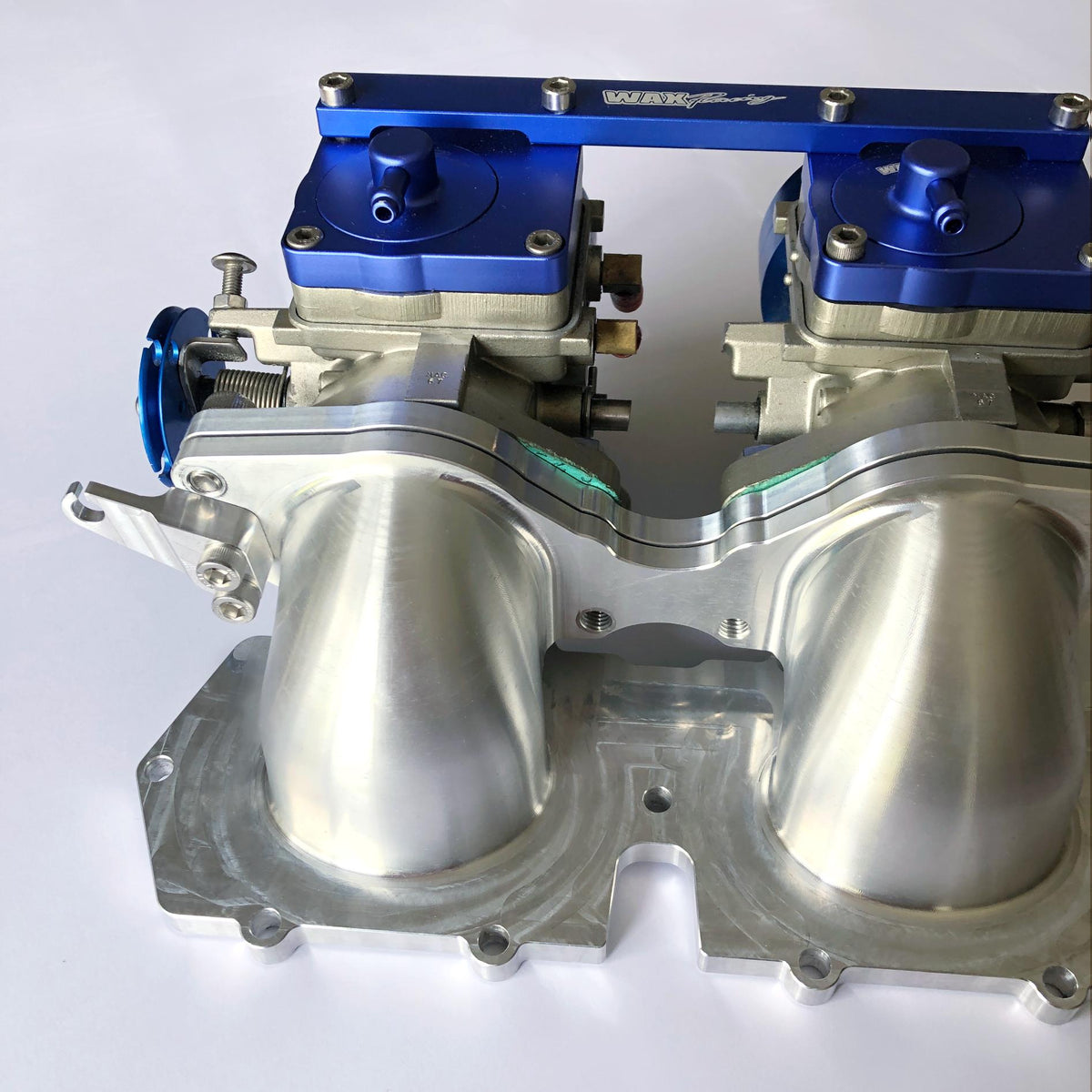Maximizing Velocity in Two-Stroke Engine Intake Manifolds: Why Speed B ...